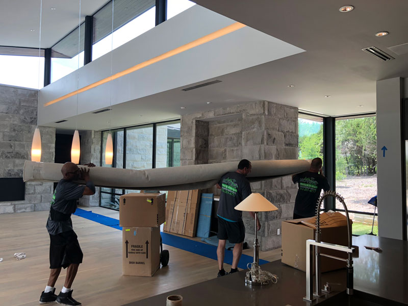 Before and After photos showing our professional Austin packing services