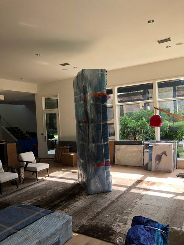 Before and After photos showing our professional Austin packing services