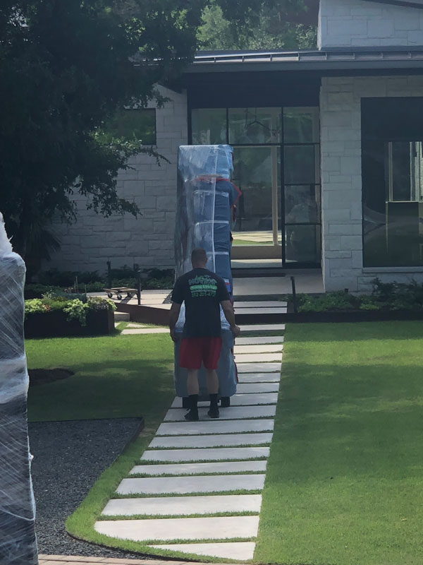 Before and After photos showing our professional Austin packing services